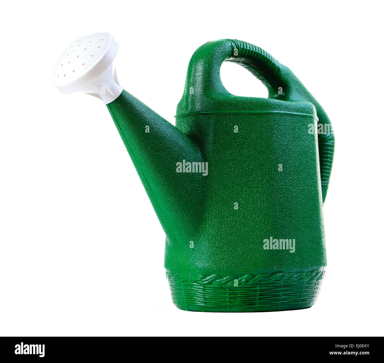 Hand pouring water from watering can Stock Photo - Alamy