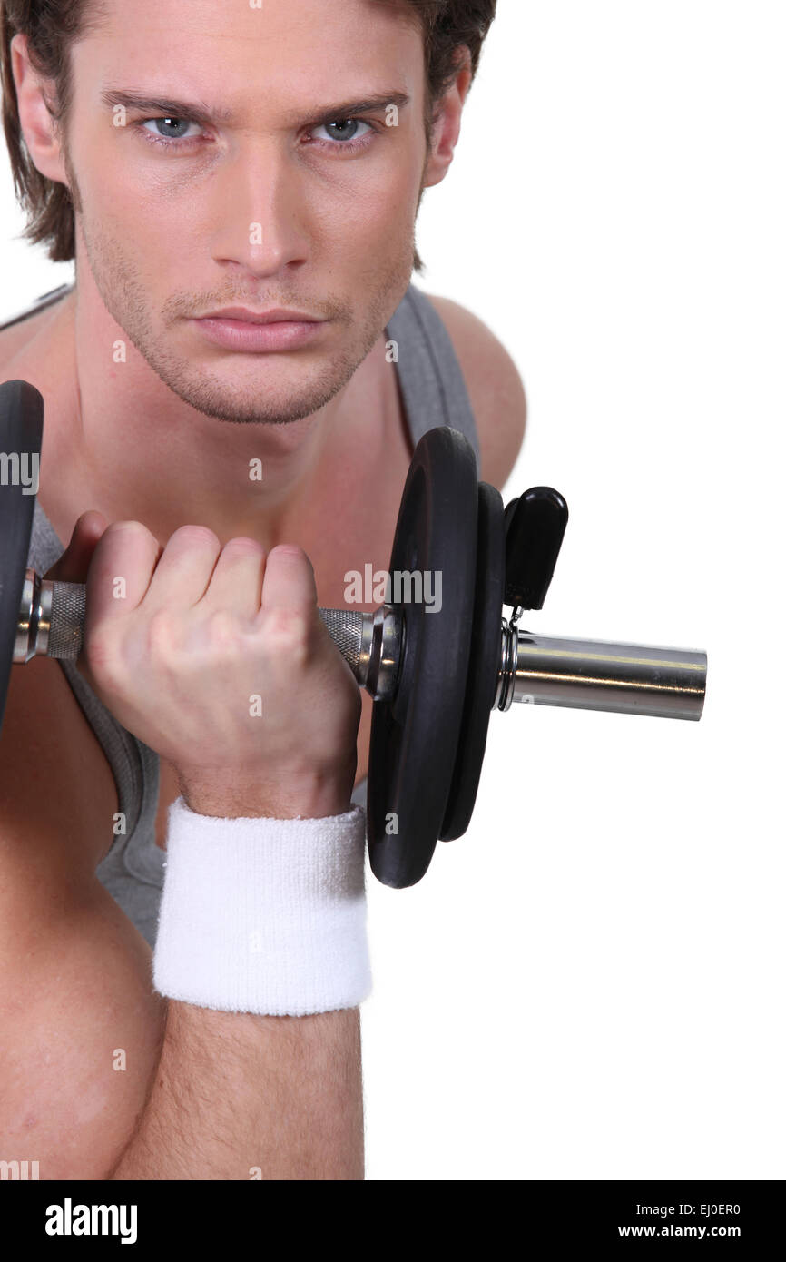 Muscular man raising heavy hi-res stock photography and images - Alamy