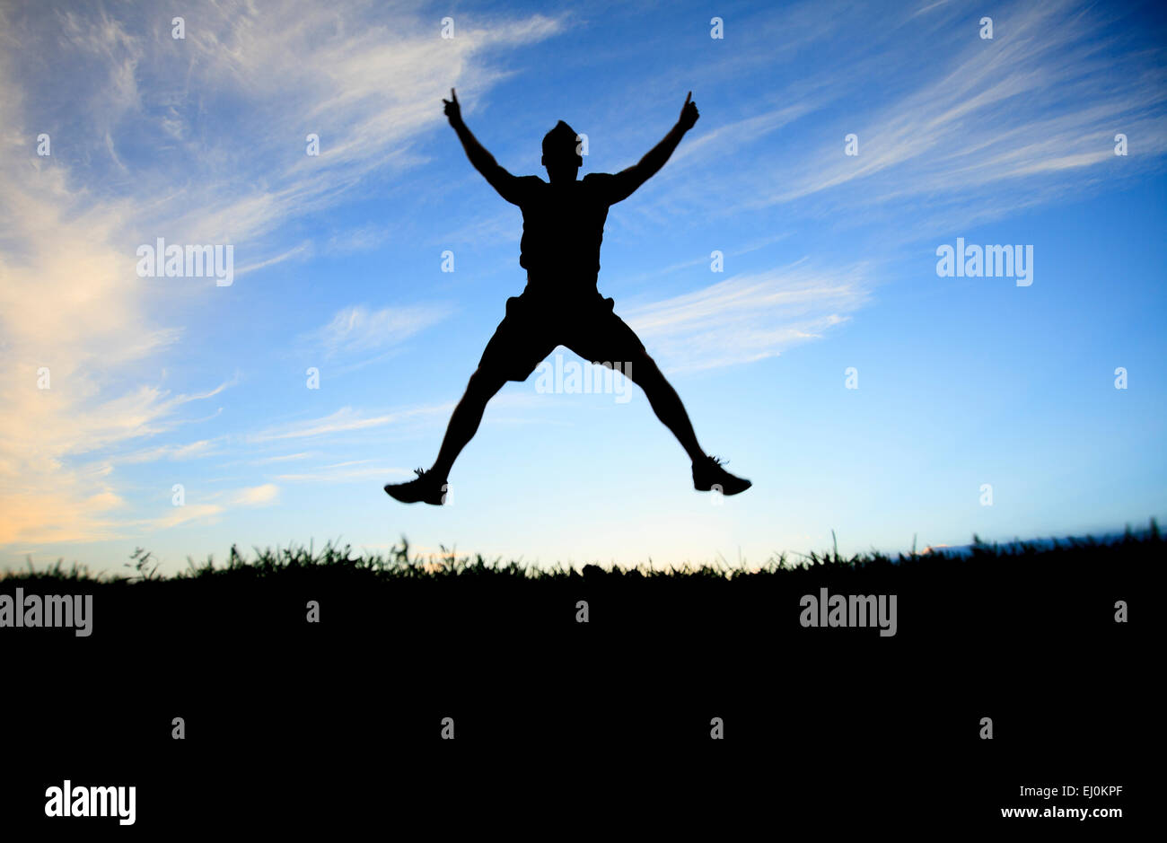 Man jump on the sunset day time Stock Photo - Alamy