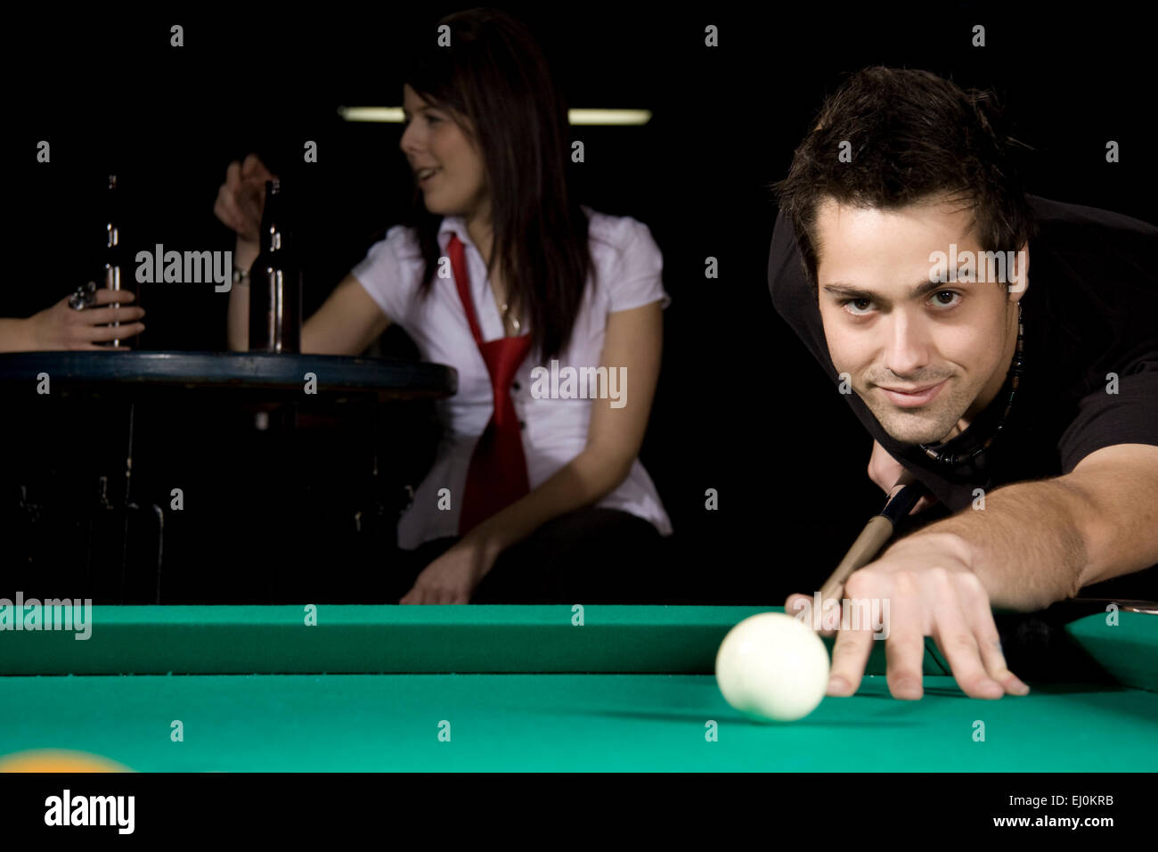 Man playing snooker in the dark club Stock Photo - Alamy