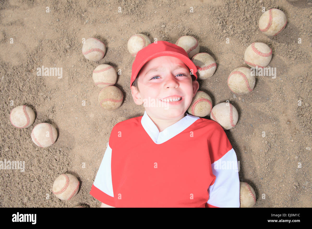 A nice child happy to play baseball Stock Photo - Alamy