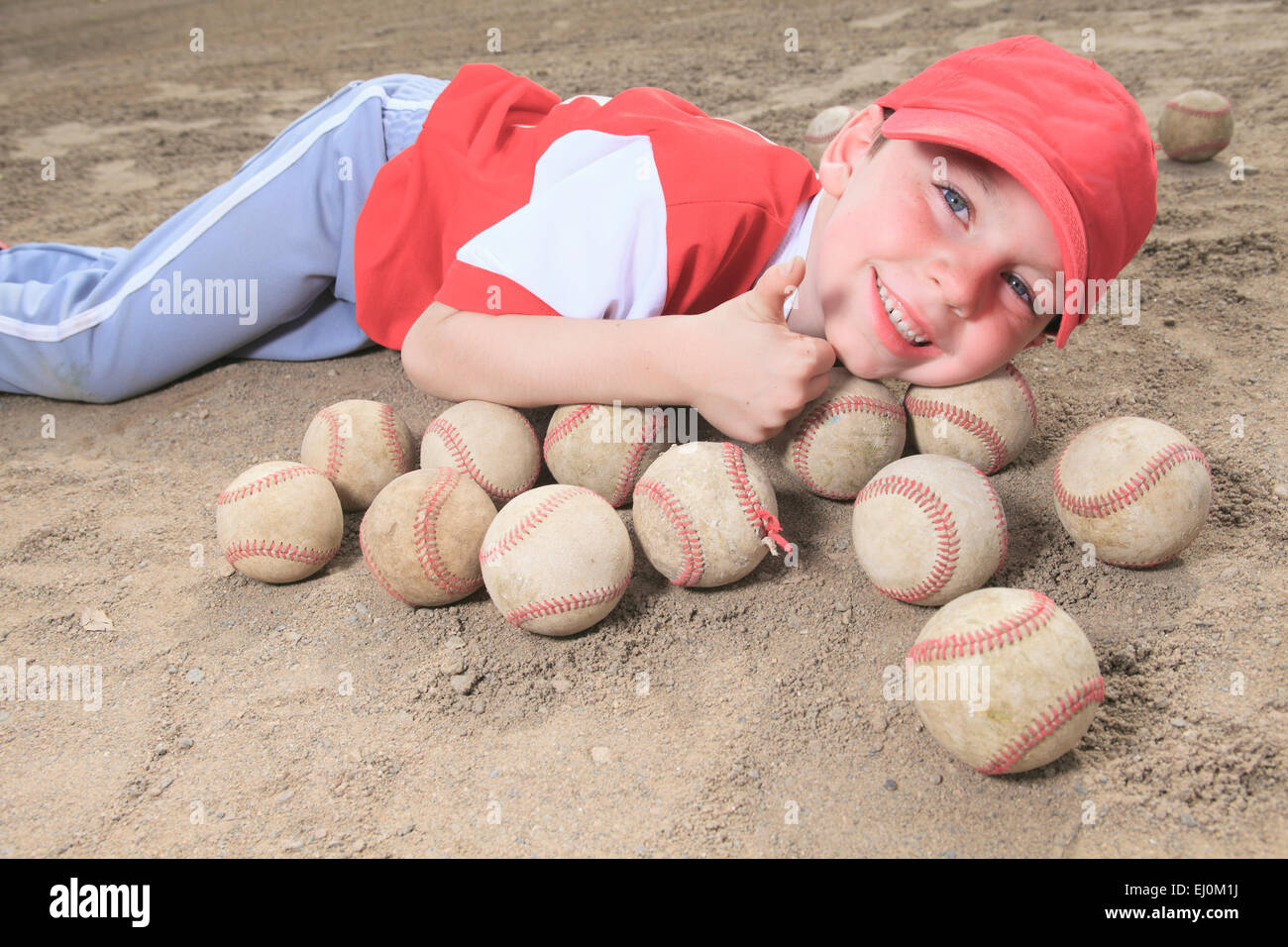 A nice child happy to play baseball Stock Photo - Alamy