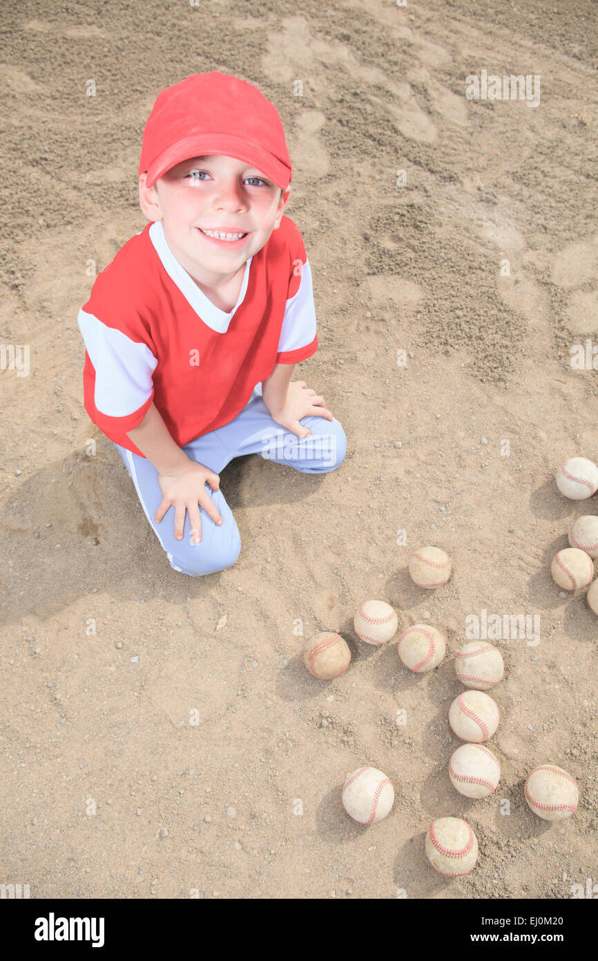 A nice child happy to play baseball Stock Photo - Alamy
