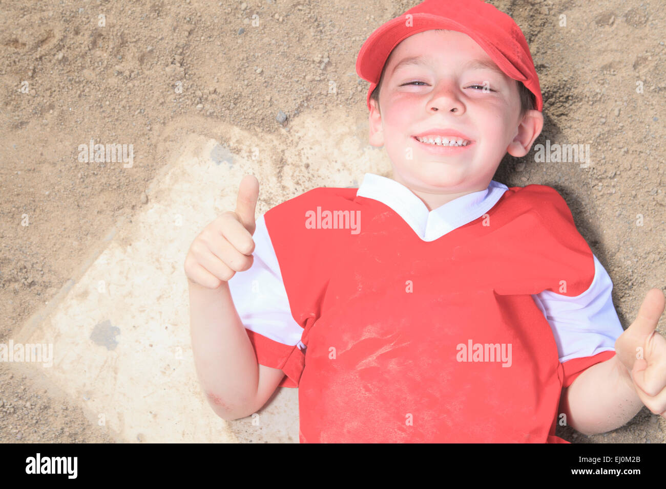 A nice child happy to play baseball Stock Photo - Alamy