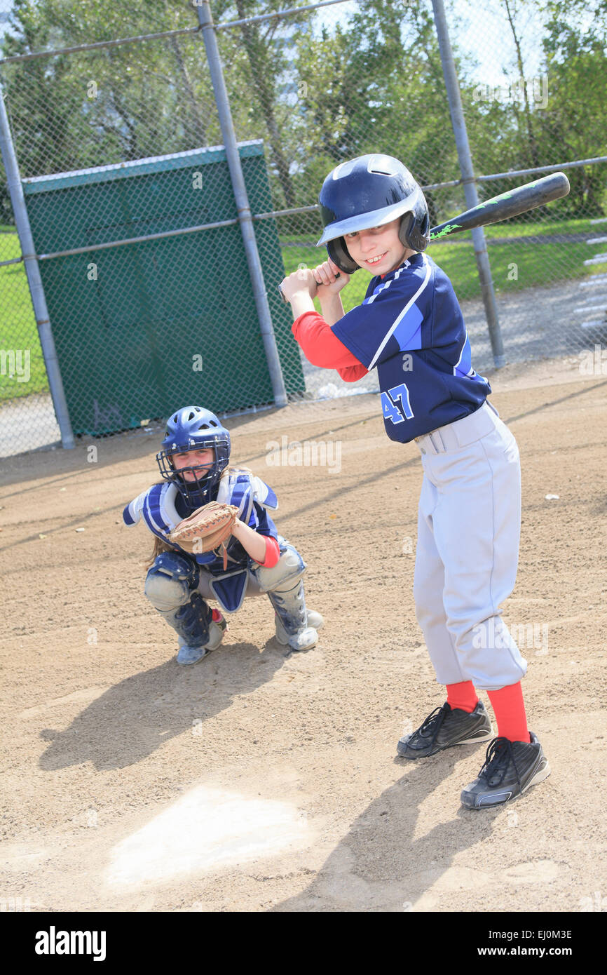 A baseball team of children play this sport Stock Photo - Alamy