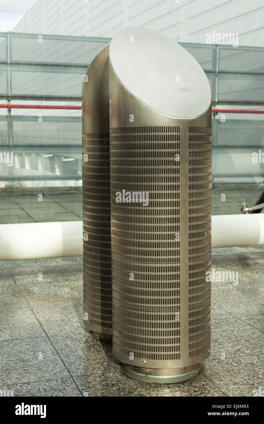 Metal columns housing air conditioning vents Stock Photo - Alamy