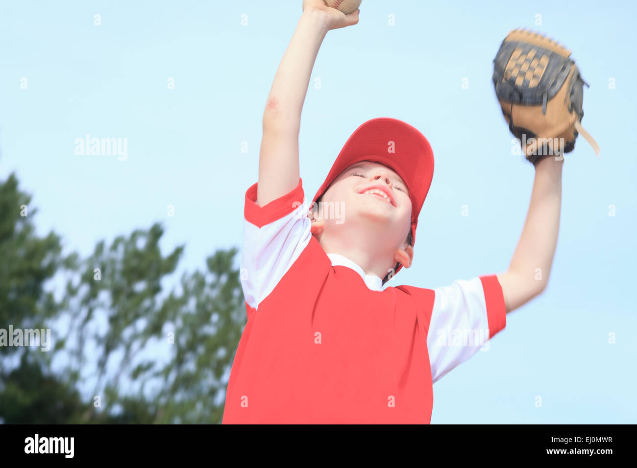 A nice child happy to play baseball Stock Photo - Alamy