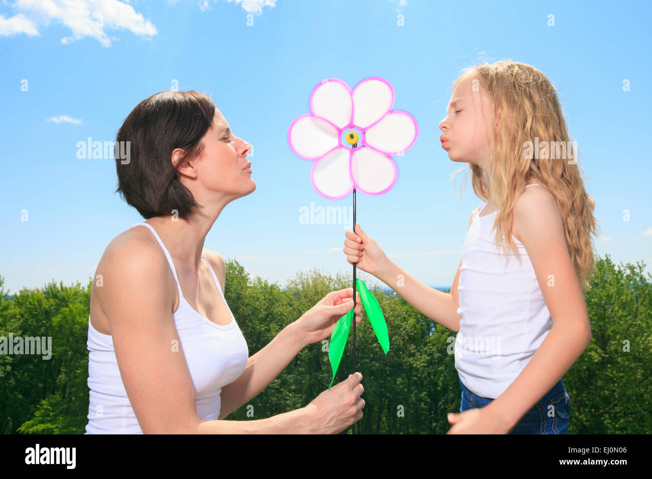 Mother and Daughter play with the wind Stock Photo - Alamy