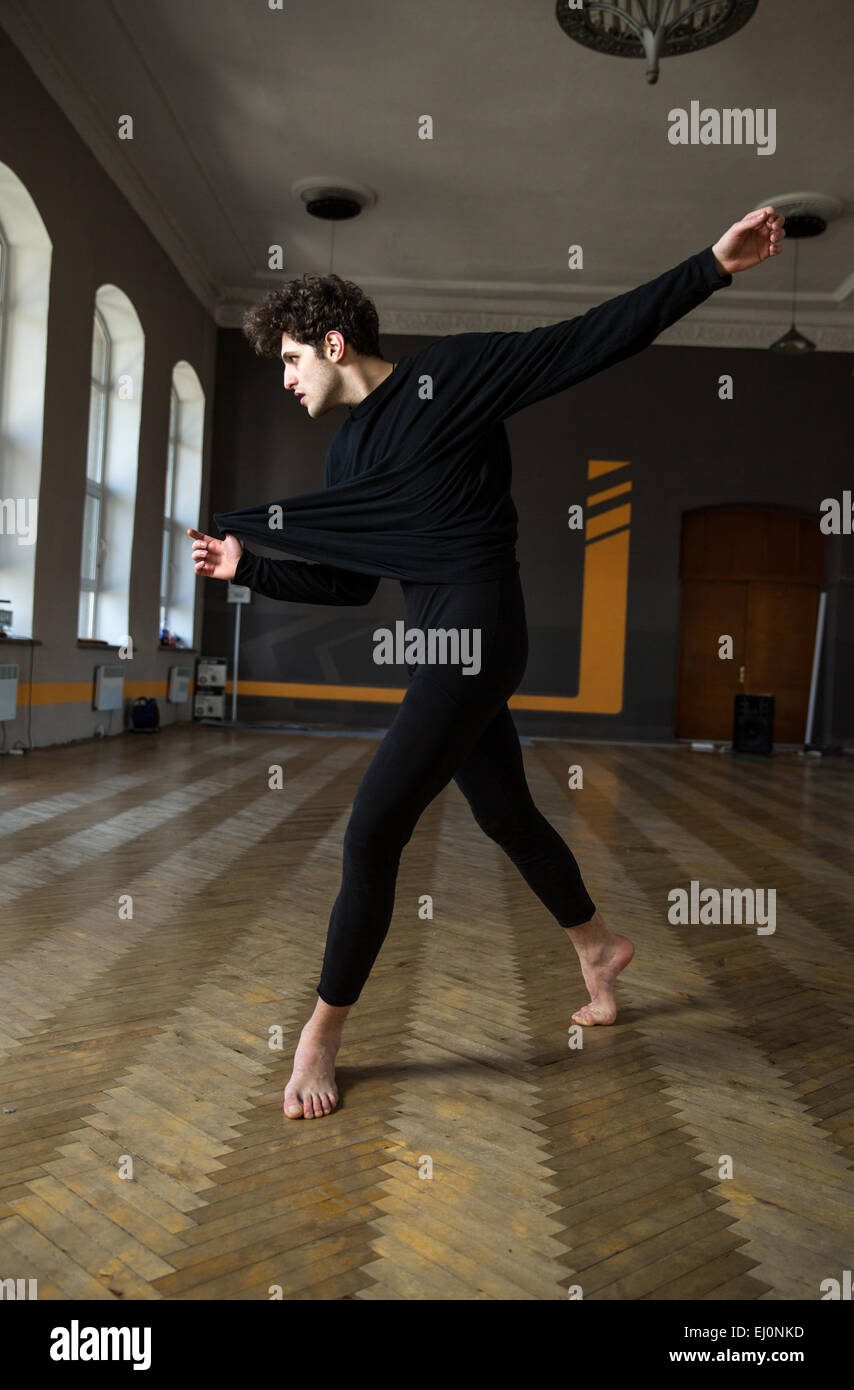 Young man dancing ballet at gym Stock Photo - Alamy