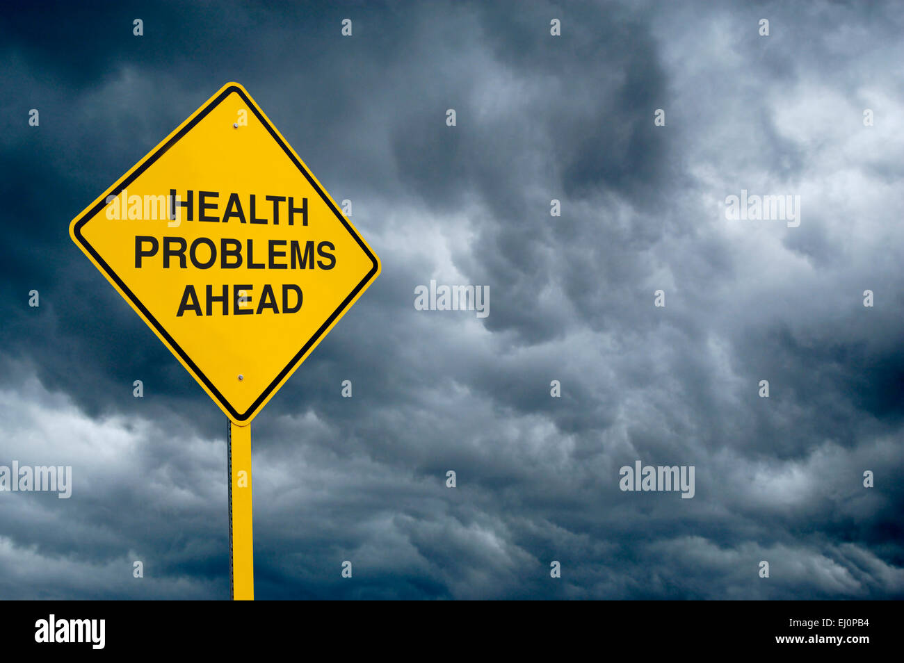 Stormy background with a health problems ahead road sign Stock Photo ...