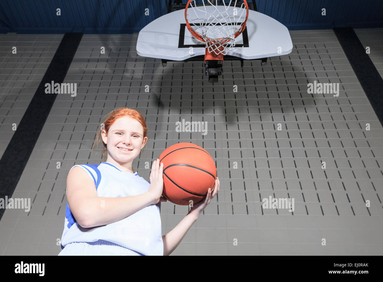 High school student playing basketball hi-res stock photography and ...