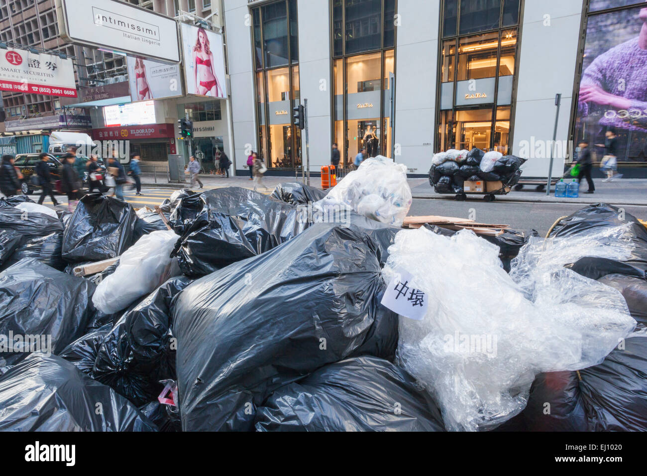 China, Hong Kong, Refuse Sacks Waiting Collection Stock Photo - Alamy