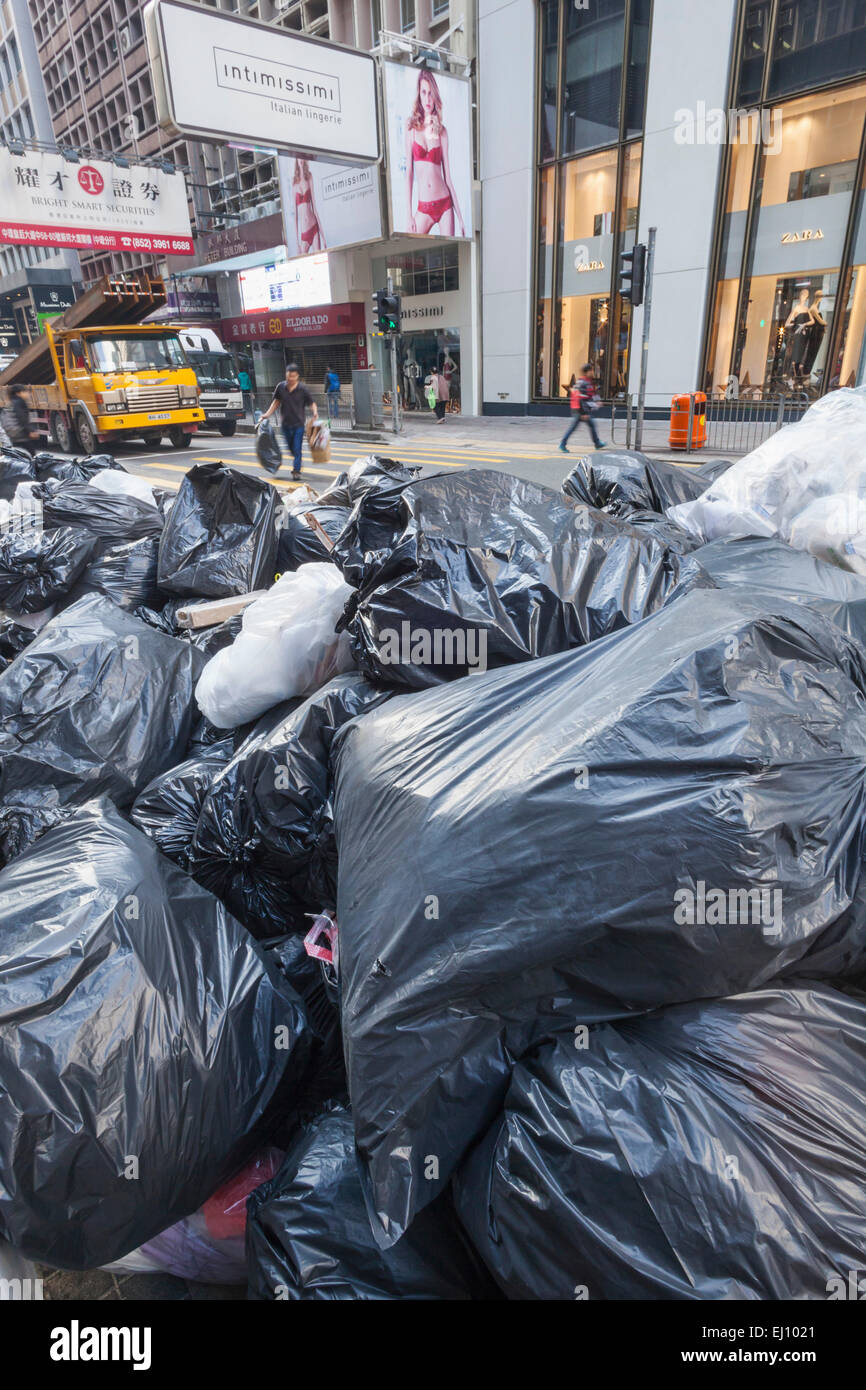 China, Hong Kong, Refuse Sacks Waiting Collection Stock Photo - Alamy