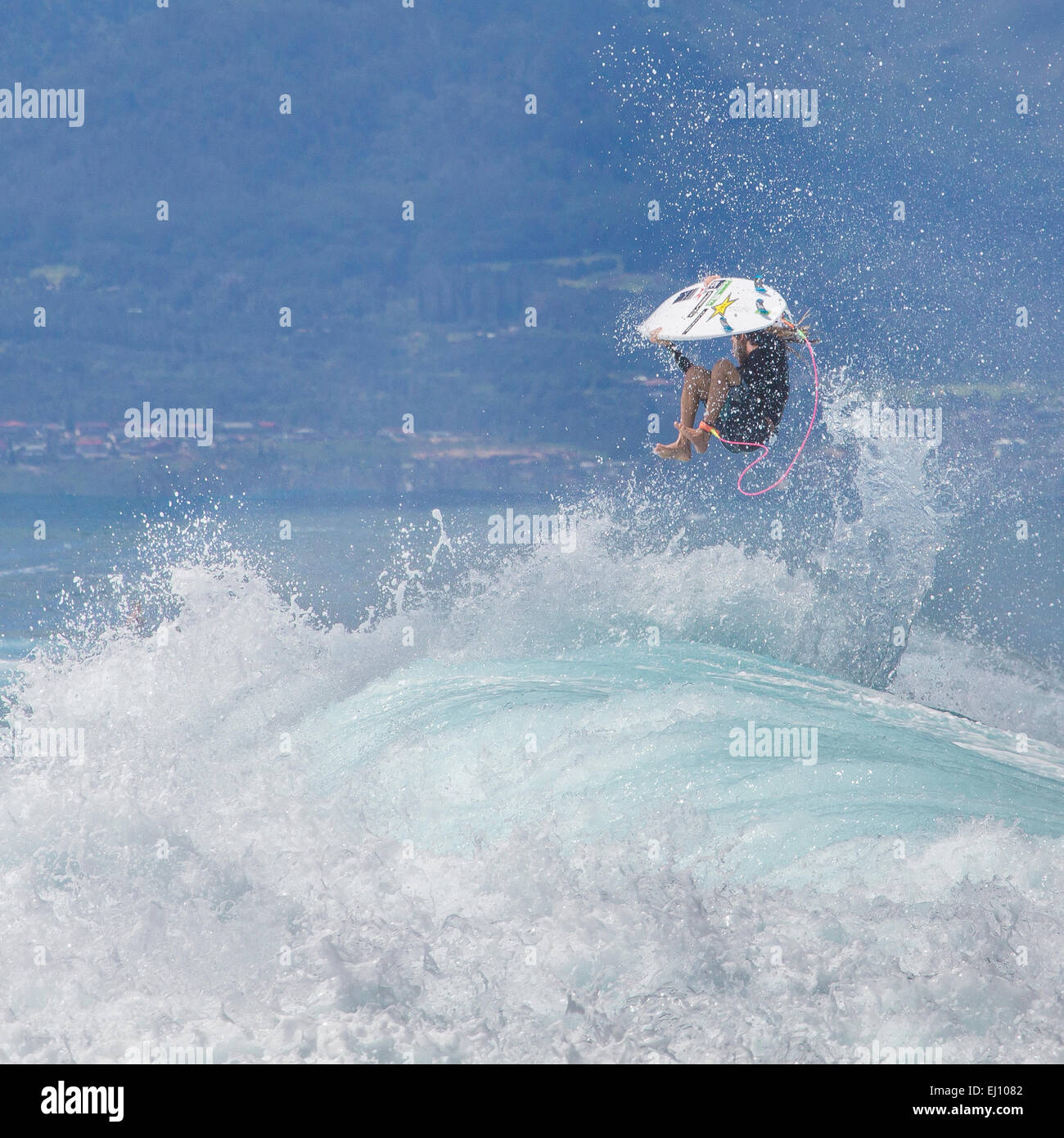 Extreme surfer riding giant ocean wave in Hawaii Stock Photo - Alamy
