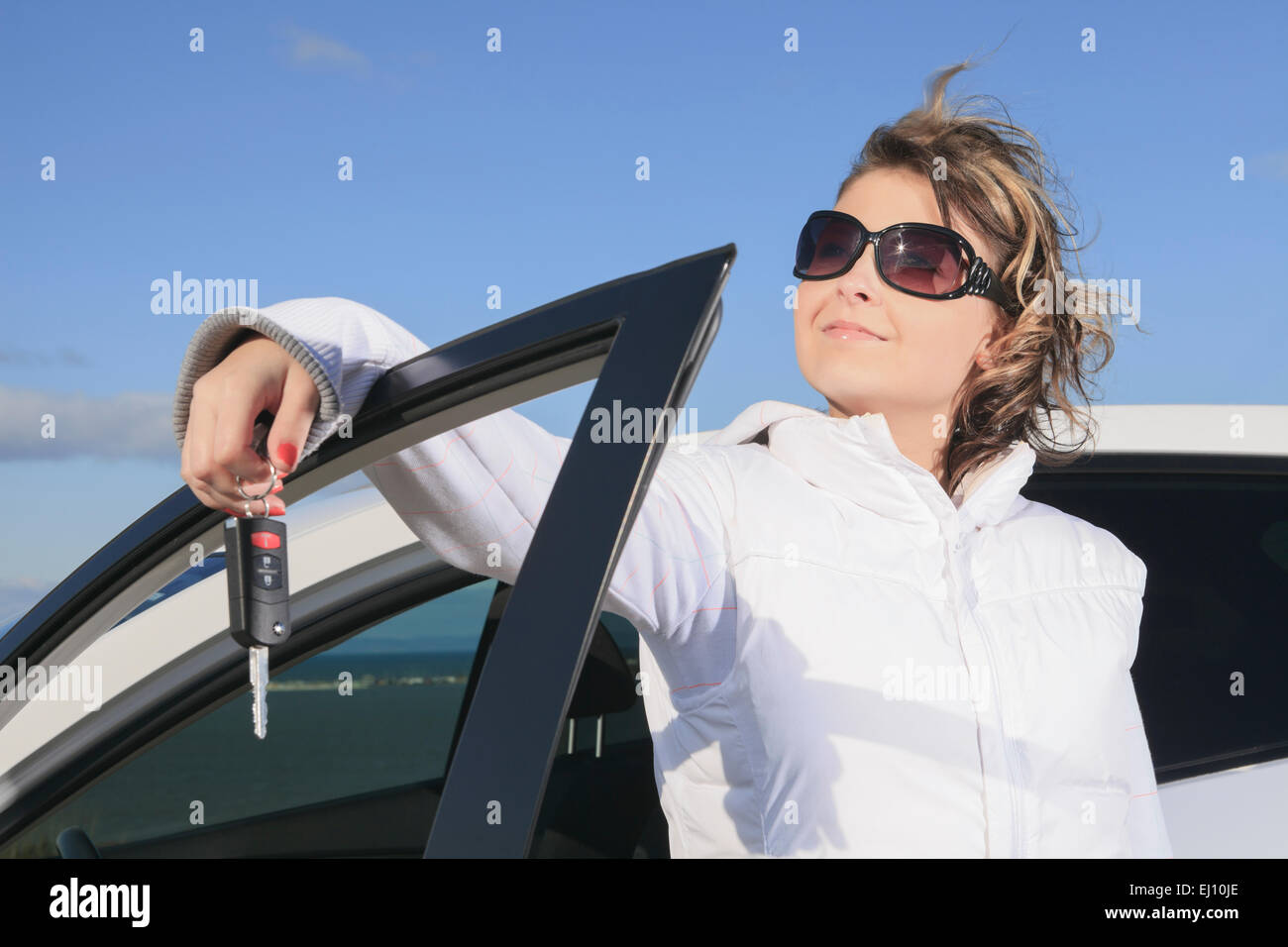Car. Woman driver happy smiling Stock Photo - Alamy