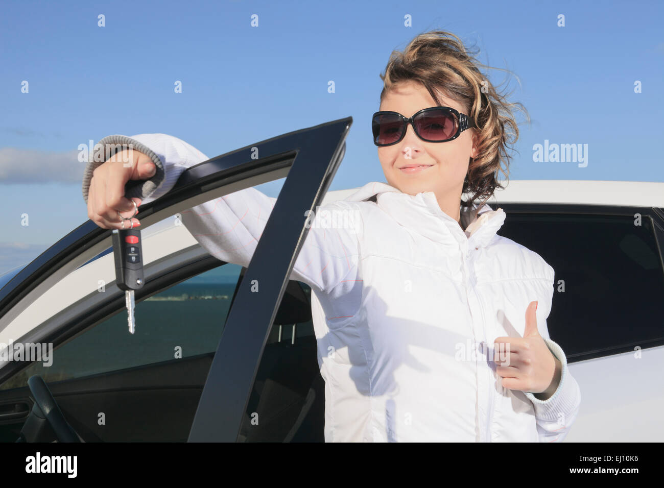 Car. Woman driver happy smiling Stock Photo - Alamy