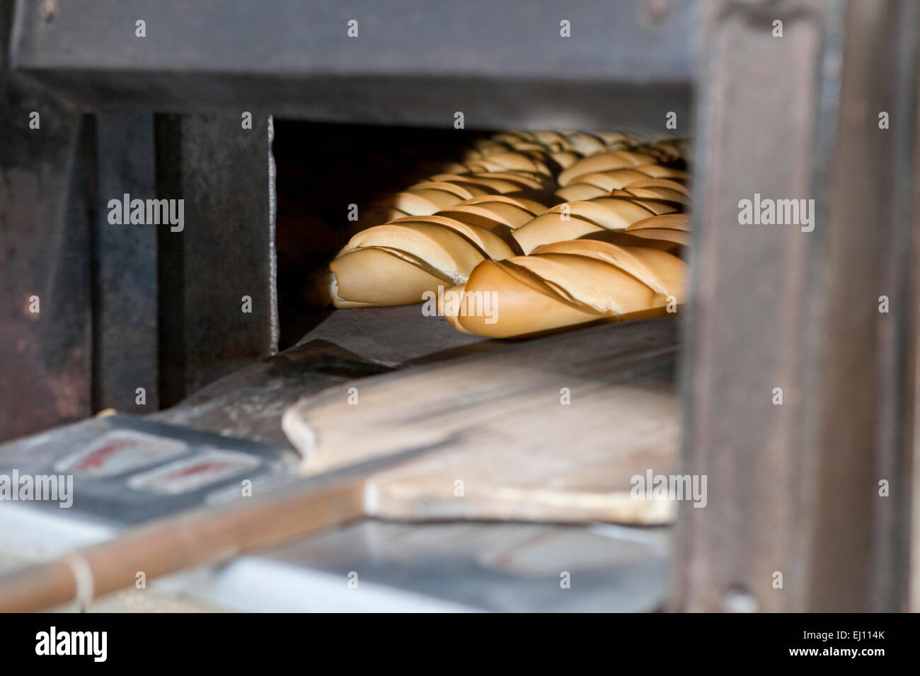 Oven inside plenty of bread. Manufacturing process of spanish bread ...