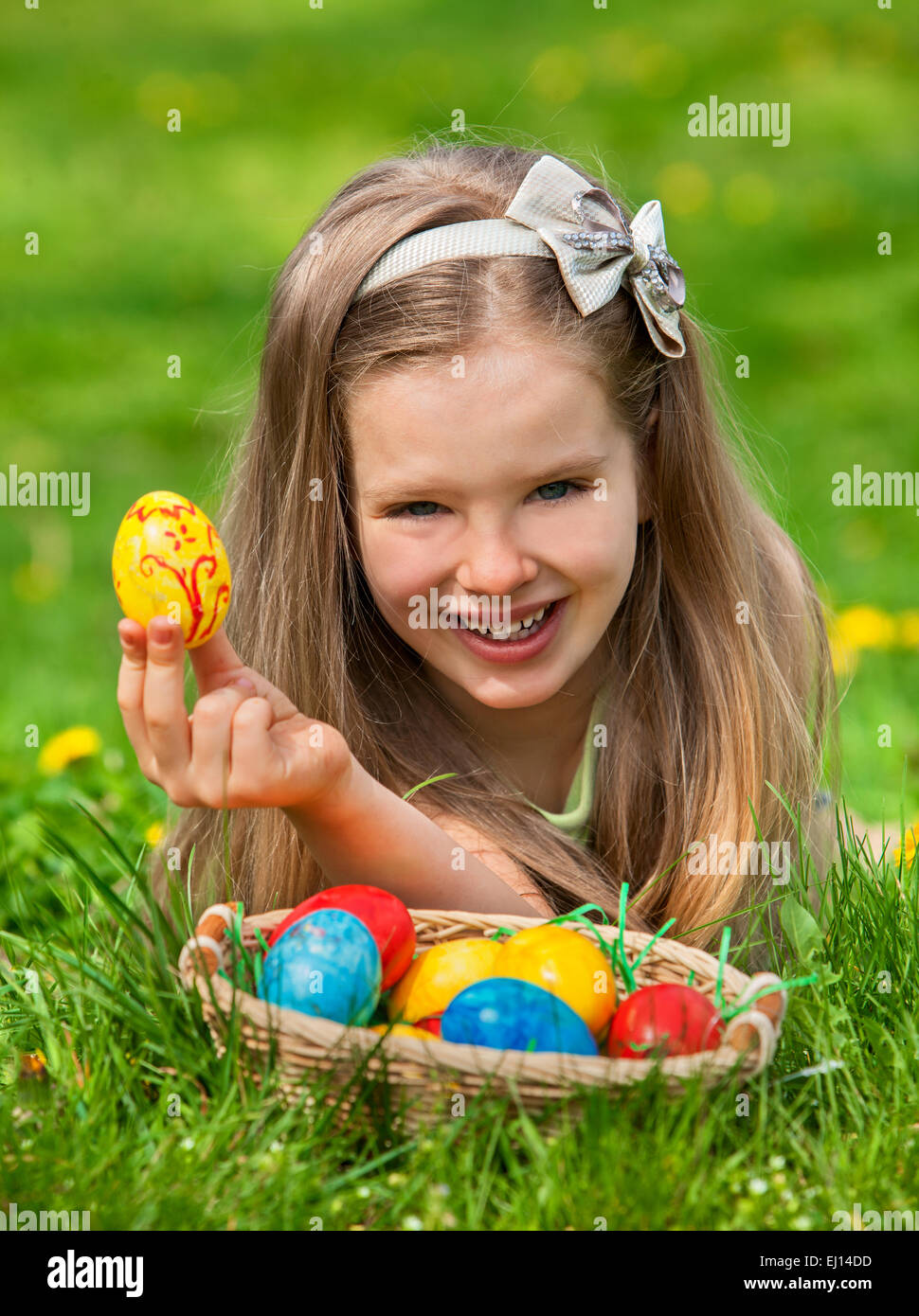Child find easter egg outdoor Stock Photo - Alamy