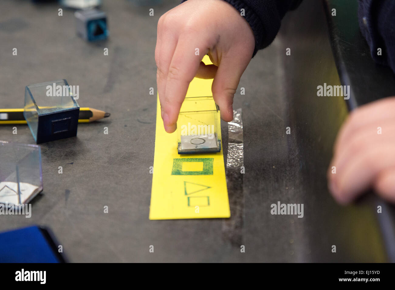 UK primary school plays with an ink stamp in a classroom Stock Photo ...