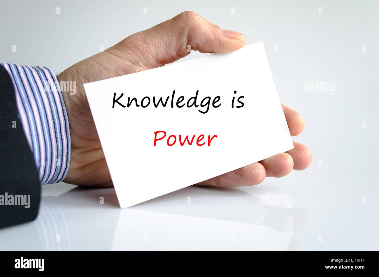 Knowledge is power note in bussines man hand Stock Photo - Alamy