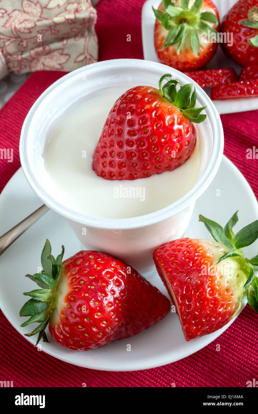 low-fat plain yogurt creamy strawberry flavor Stock Photo - Alamy