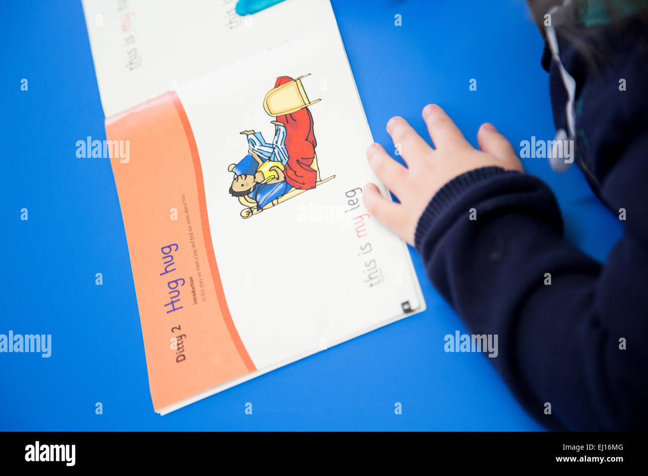 Pupil learning to read in a UK primary school classroom Stock Photo - Alamy