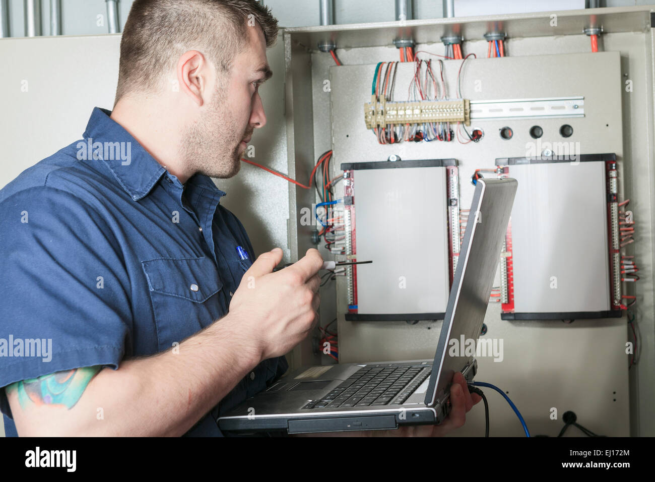 Portrait happy electrical engineer in hi-res stock photography and ...