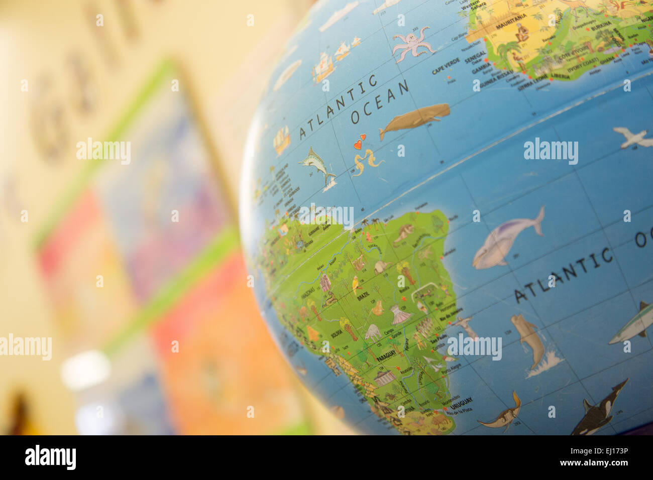 School globe in a classroom setting Stock Photo - Alamy