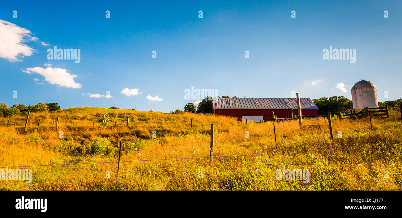 Barn and fences on a farm field in the Shenandoah Valley, Virginia ...