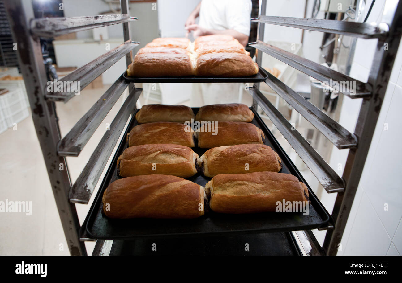 Racks of freshly baked neapolitan cakes Stock Photo - Alamy