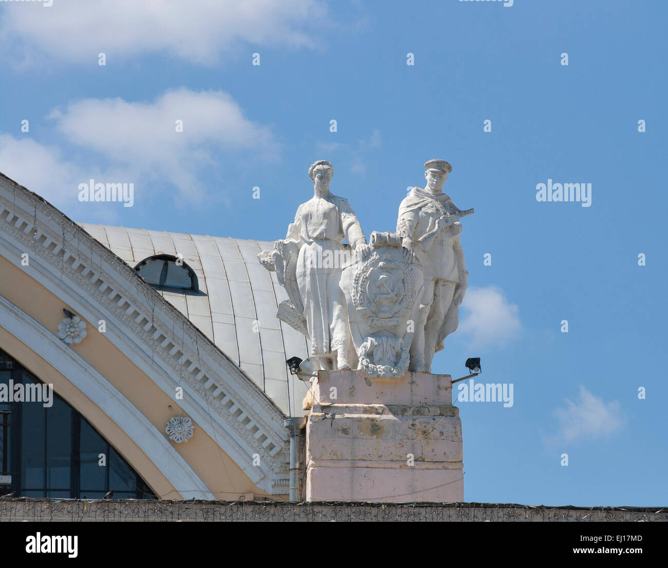 The old Soviet statue of woman collective farmer and soldier with the ...