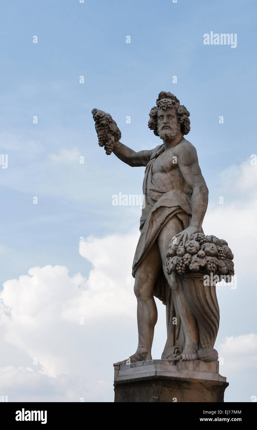 Statue of Autumn, or Bacchus in Holy Trinity Bridge of Florence, Italy ...