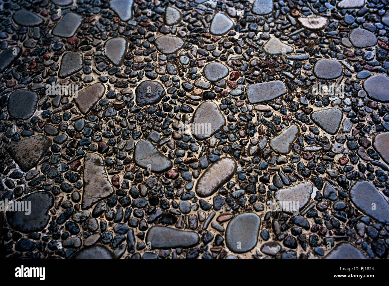 Street pavement in Ubud in Bali in Indonesia in Southeast Asia. pebble ...