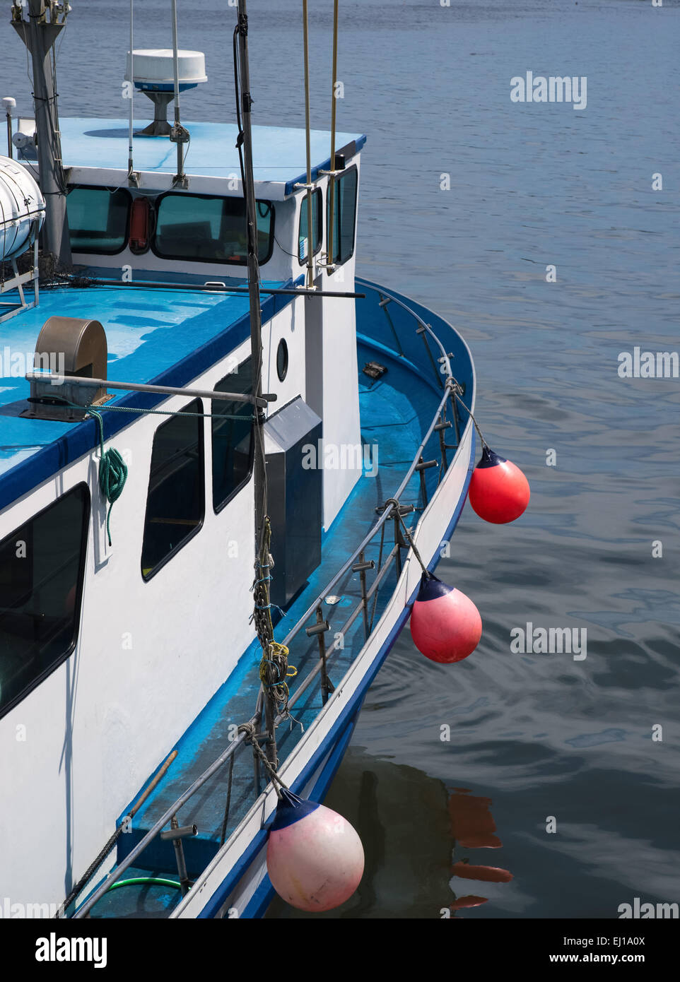 Photo of a charter fishing boat leaving the docks for open seas Stock ...