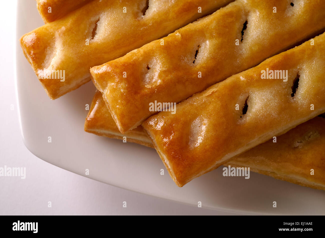 Glazed puff pastry in a dish closeup Stock Photo - Alamy