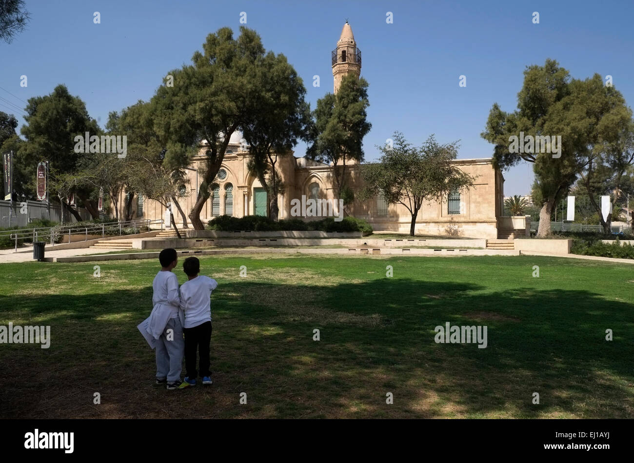 Israeli children in front of the Great Mosque in Beersheva which is ...