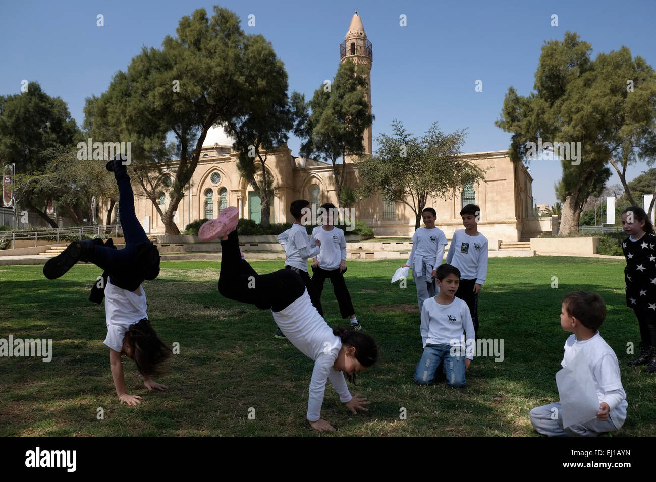 Young Israeli school children playing in front of the Great Mosque ...