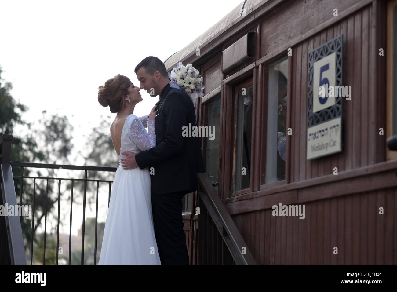 An Israeli bride and groom posing in a pre wedding photography session ...