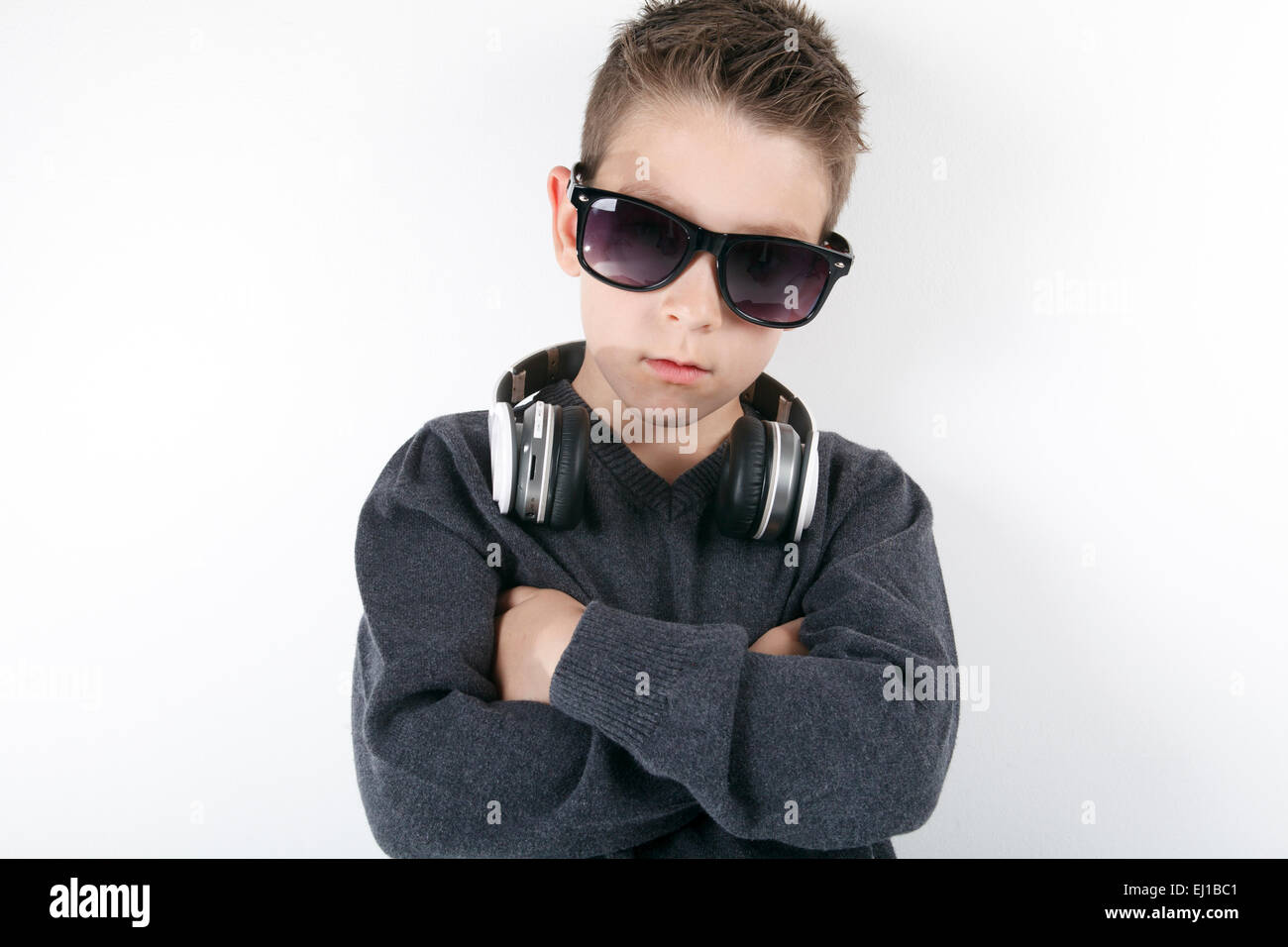 Young boy wearing headphones Stock Photo - Alamy
