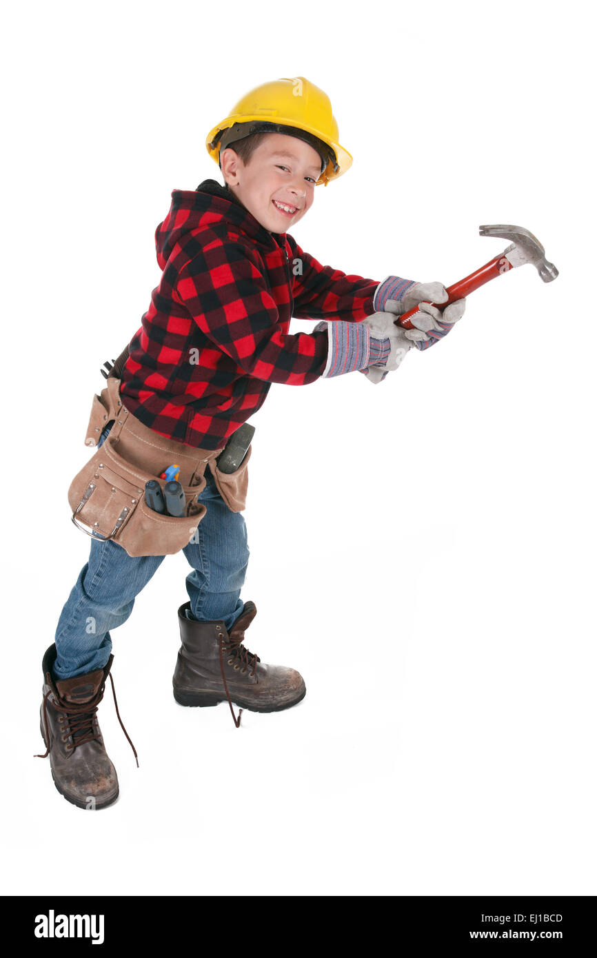 Young boy pretending to be a carpenter Stock Photo - Alamy