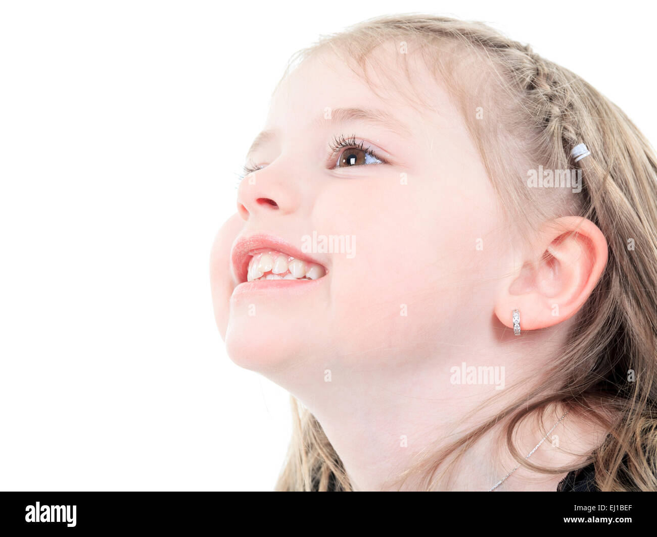 laugh a little girl at the studio shooting Stock Photo - Alamy