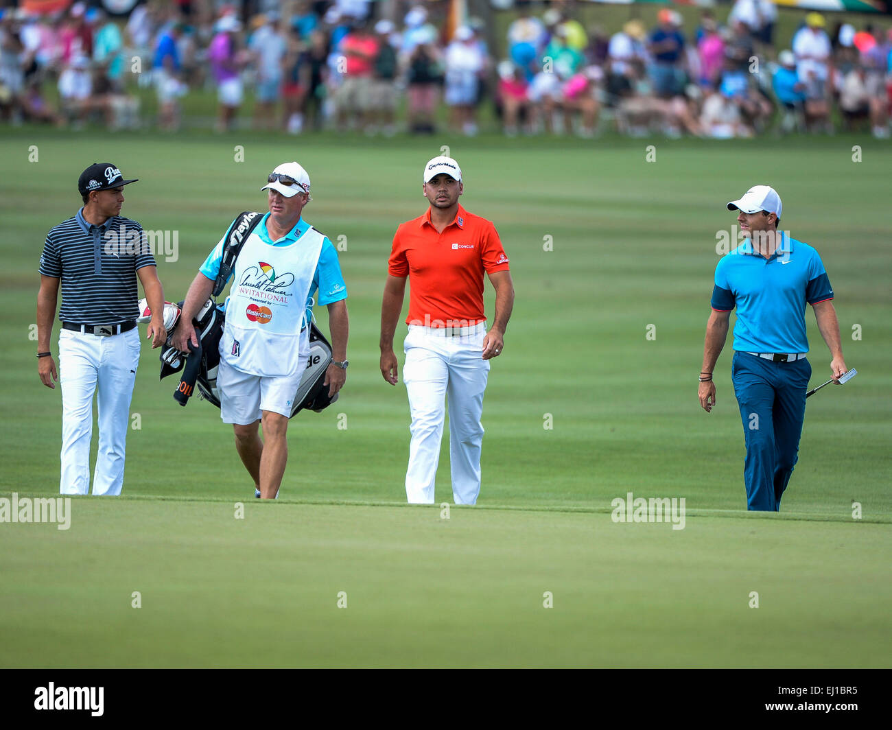 Orlando, FL, USA. 19th Mar, 2015. L-R Rickie Fowler, caddy Colin ...