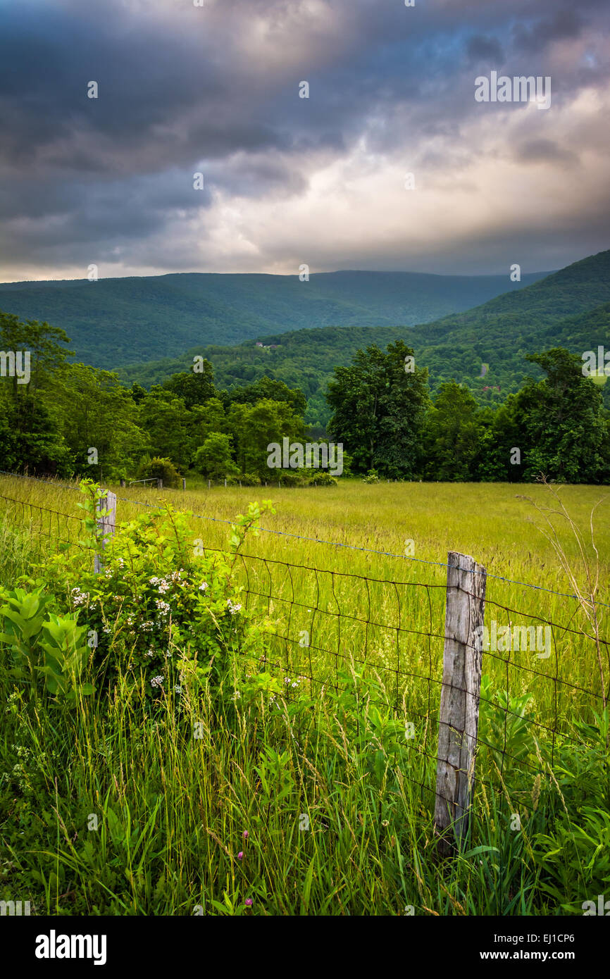 Fence and morning view of mountains in the rural Potomac Highlands of ...