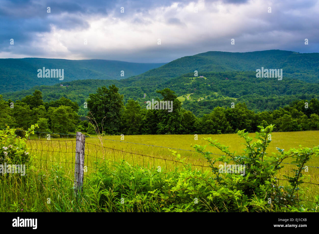 Fence and morning view of mountains in the rural Potomac Highlands of ...