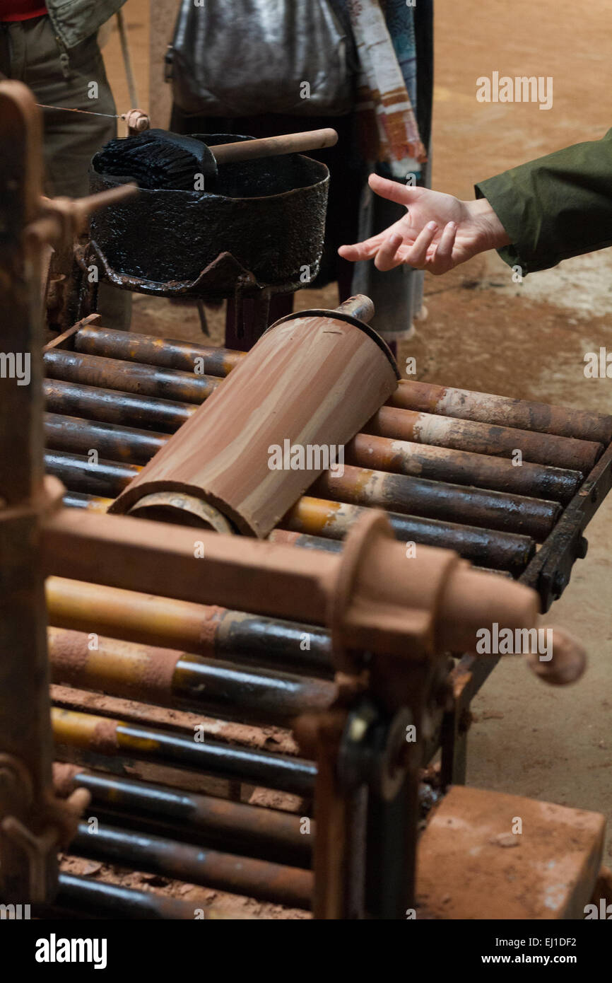 Close up view of traditional mud roof tile production Stock Photo - Alamy