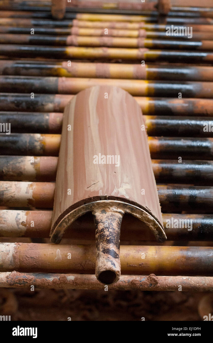 Close up view of traditional mud roof tile production Stock Photo - Alamy
