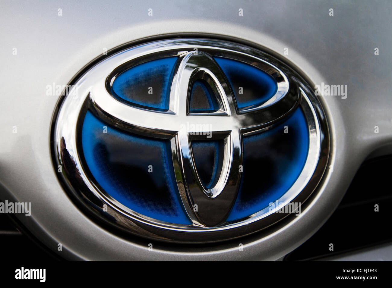 Close up view of the hybrid Toyota logo car Stock Photo - Alamy