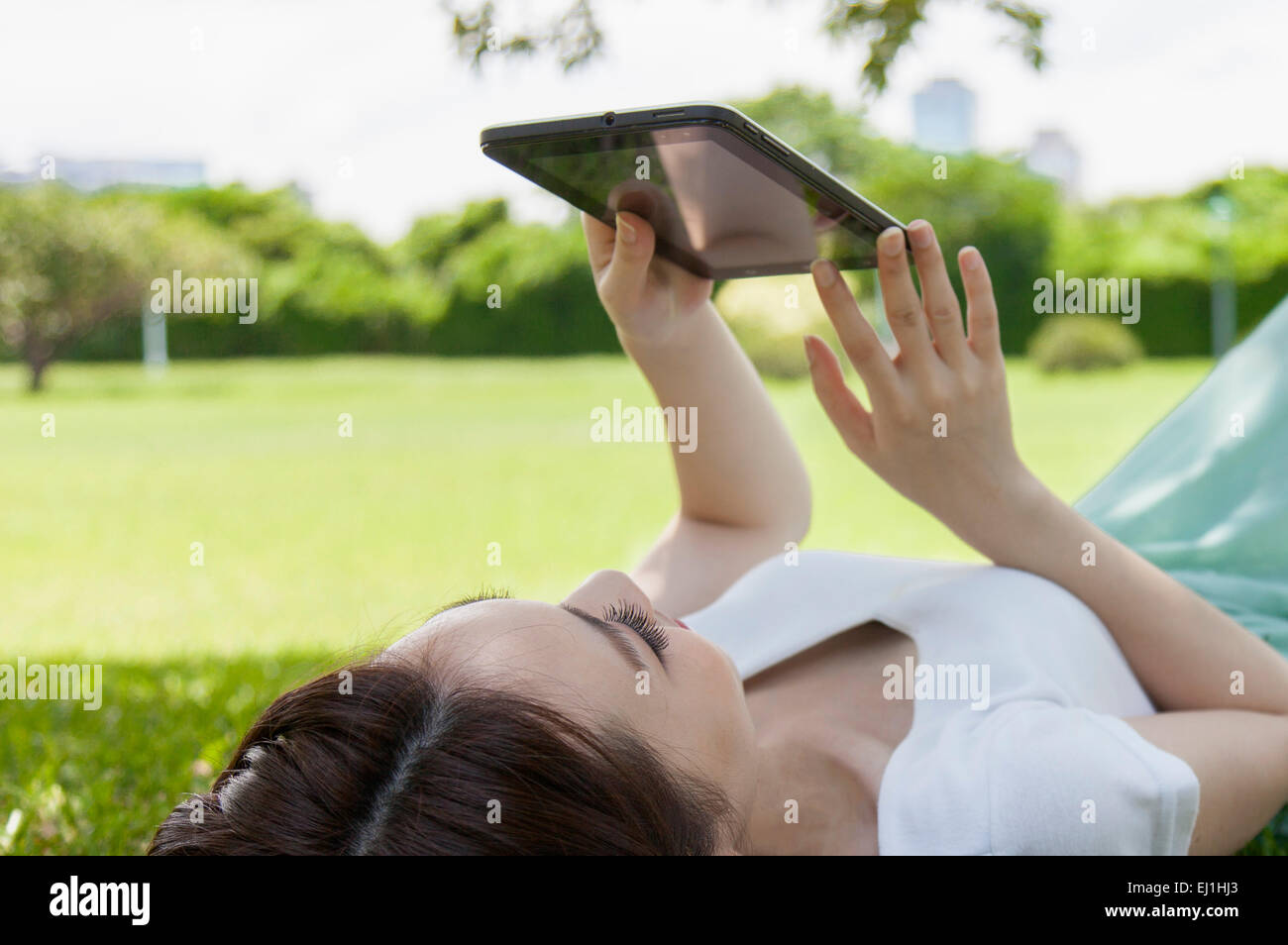 Lying down and computer hi-res stock photography and images - Alamy