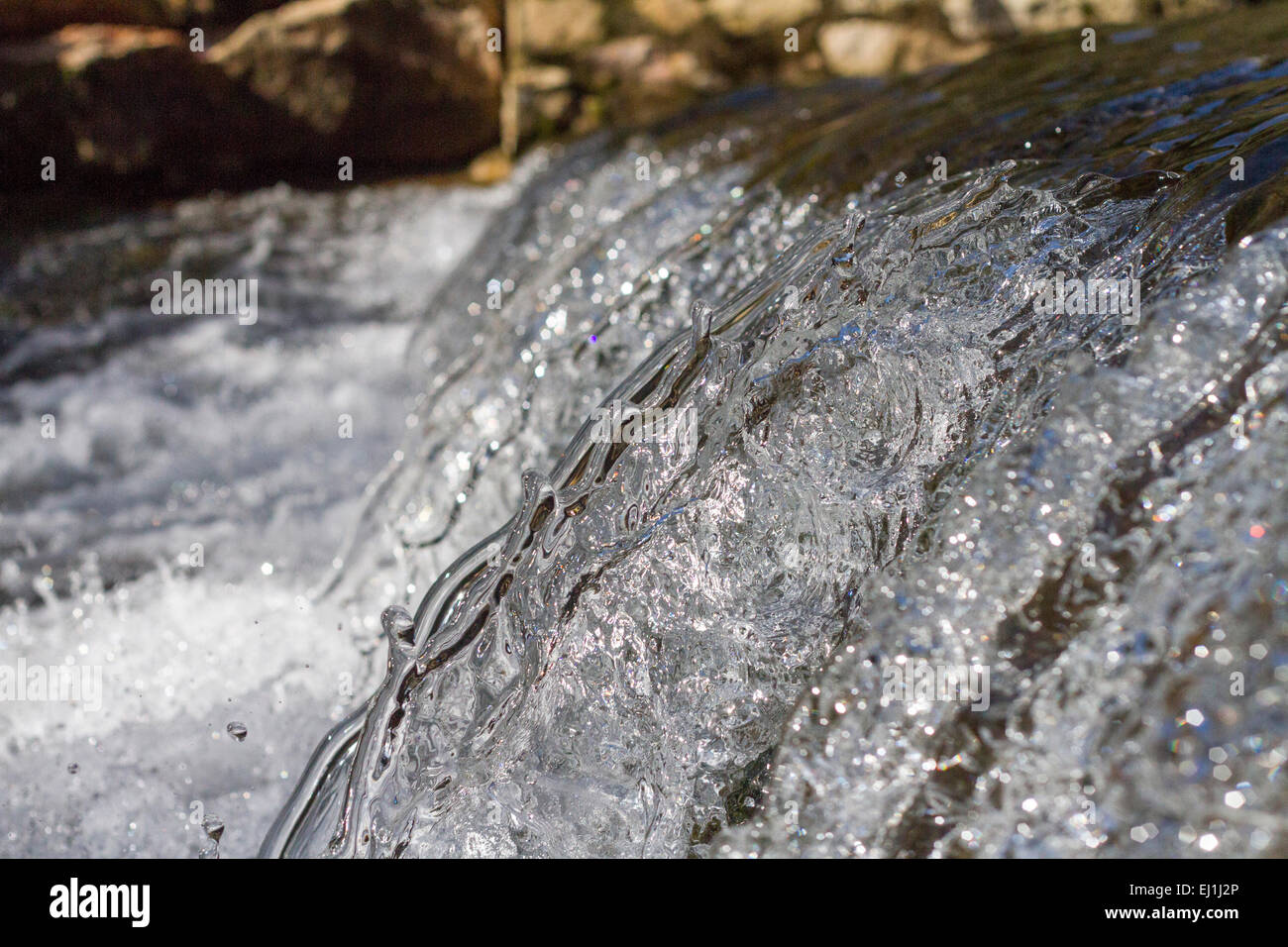 Close up view of a fresh stream of water on the forest Stock Photo - Alamy