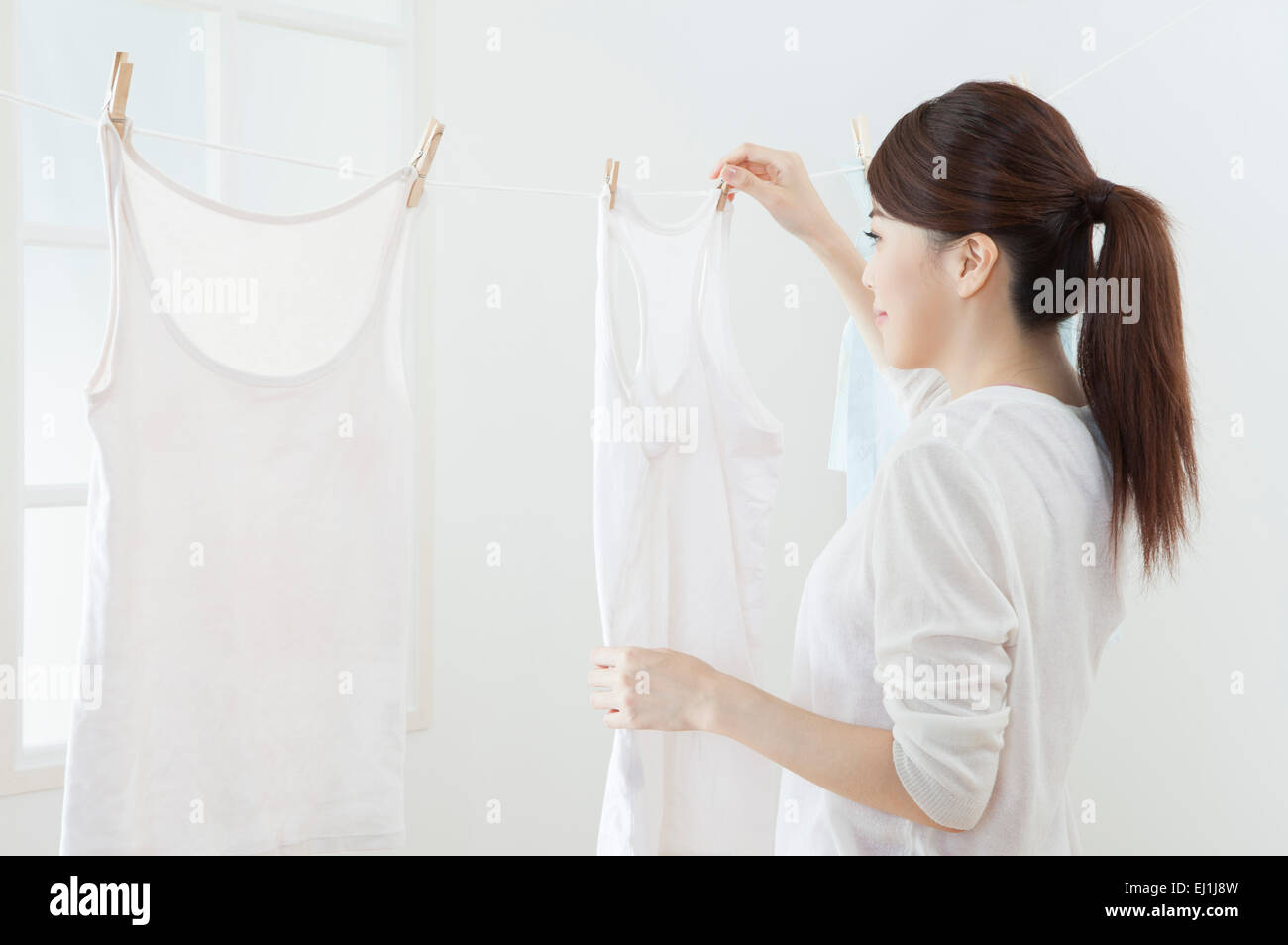 Drying clothes hi-res stock photography and images - Alamy